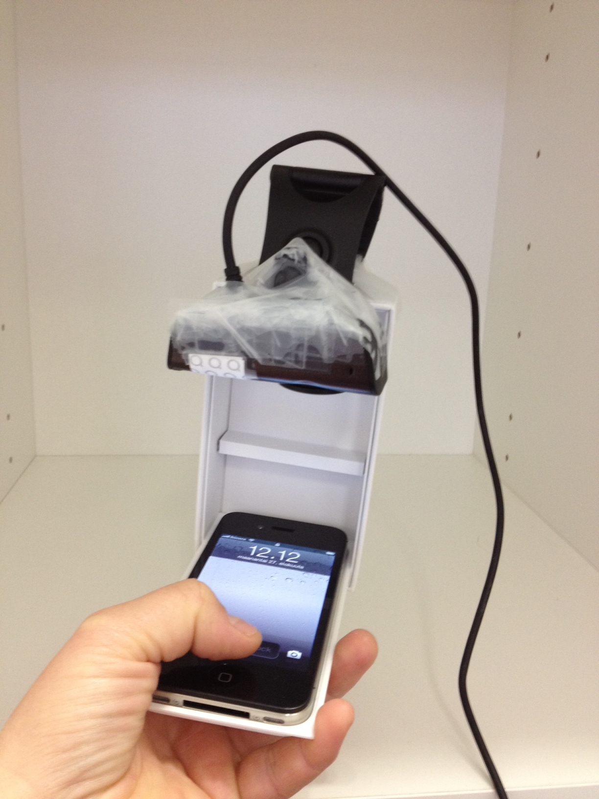 How to use an iPhone packaging box to make an iPhone testing sled - Altom